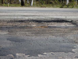 PAVEMENT FAILURES - Sand & Stone